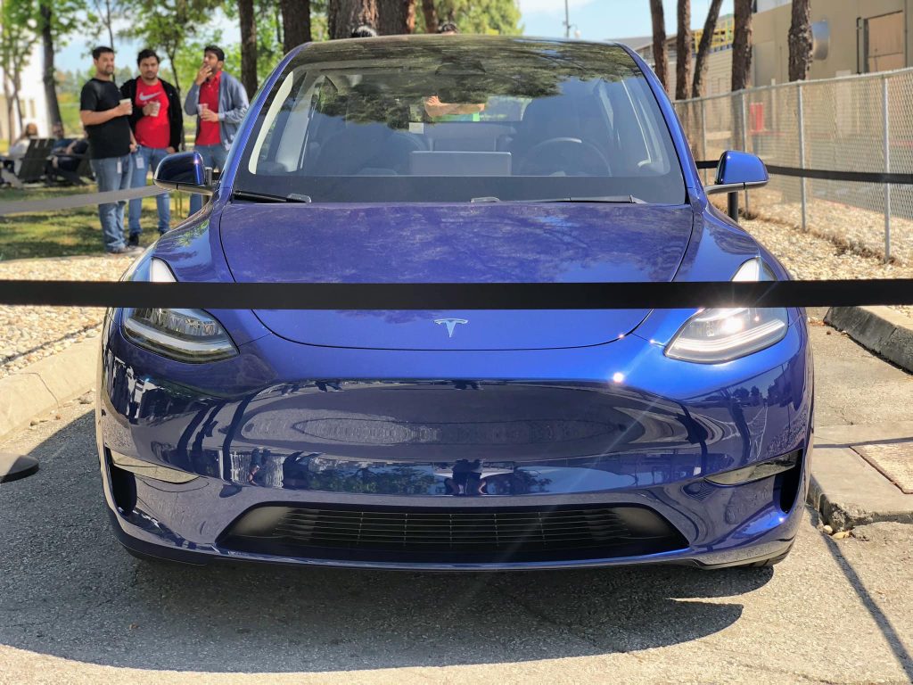 Blue Tesla Model Y walk around video shows glimpse of third row seats ...