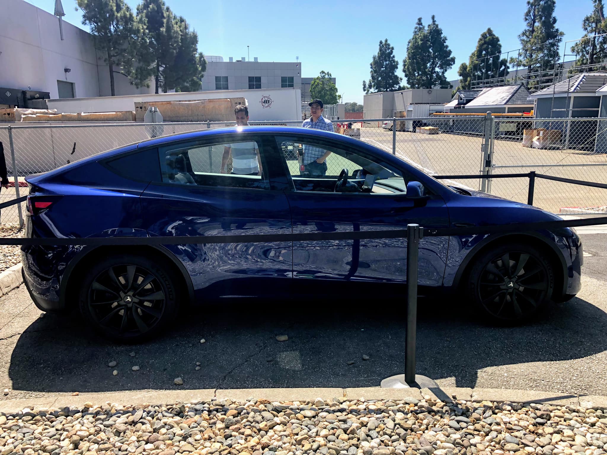 Blue Tesla Model Y walk around video shows glimpse of third row seats ...