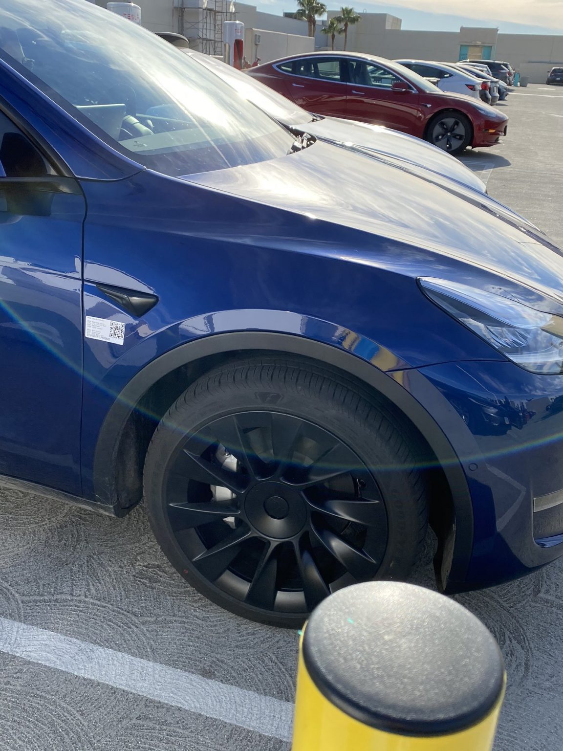 Up close photos of blue Model Y spotted at Supercharger in California ...