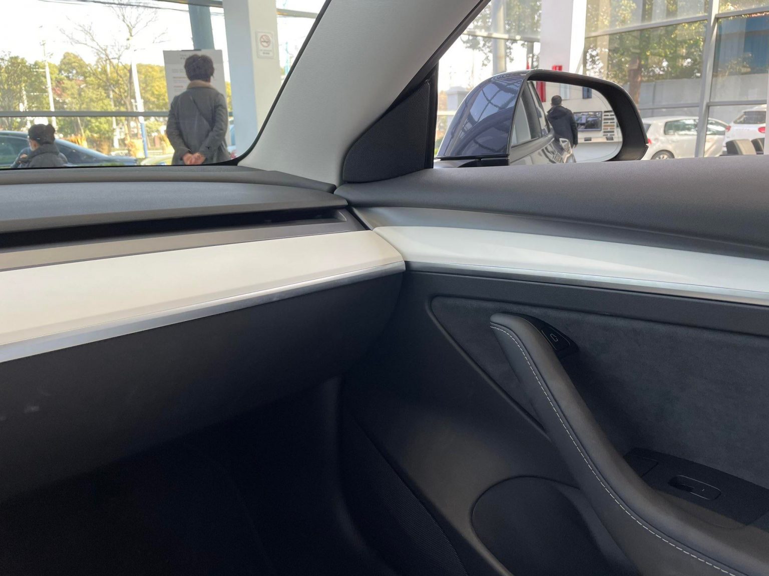 Up-close look at new Tesla Model 3 wood door trim in white - Drive Tesla