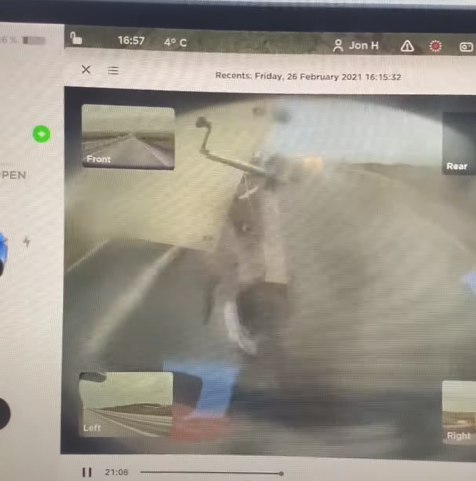 Watch a Tesla Model 3 spin out after the trailer it is towing is blown ...