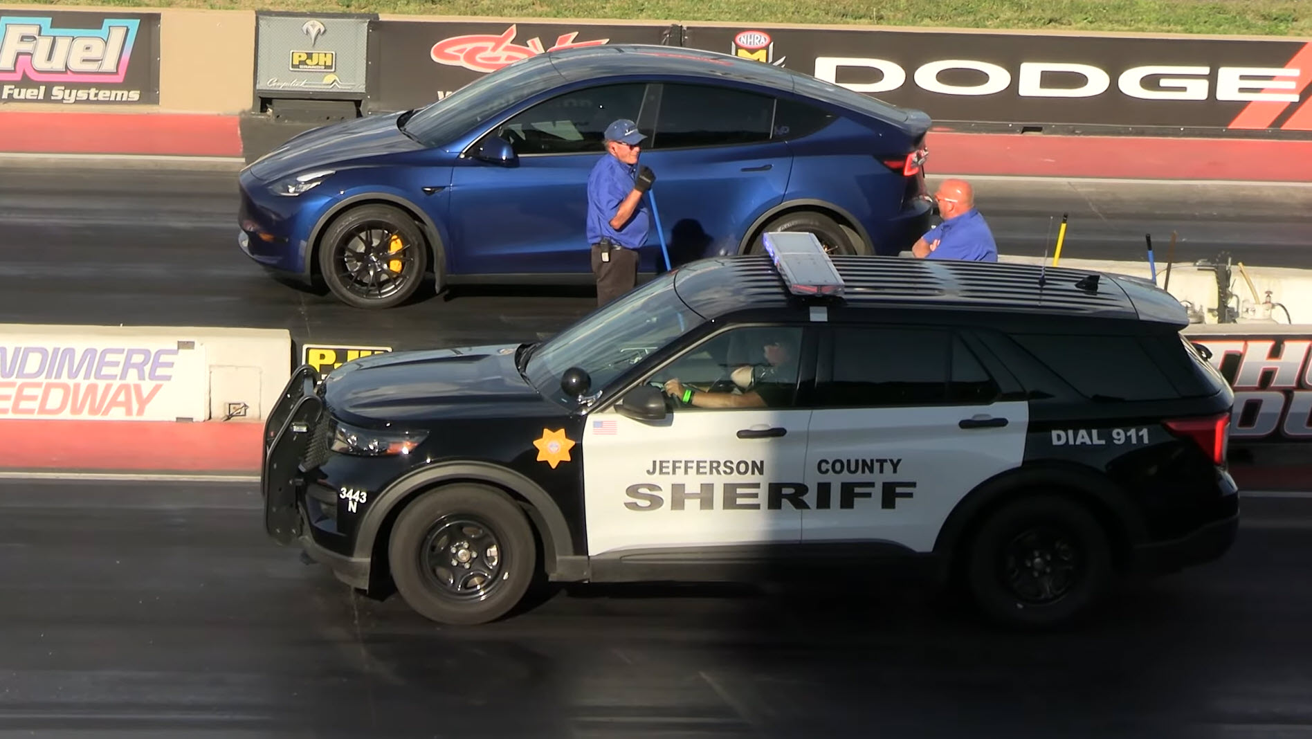 Tesla Model Y takes on Ford Police Interceptor in quarter-mile drag ...