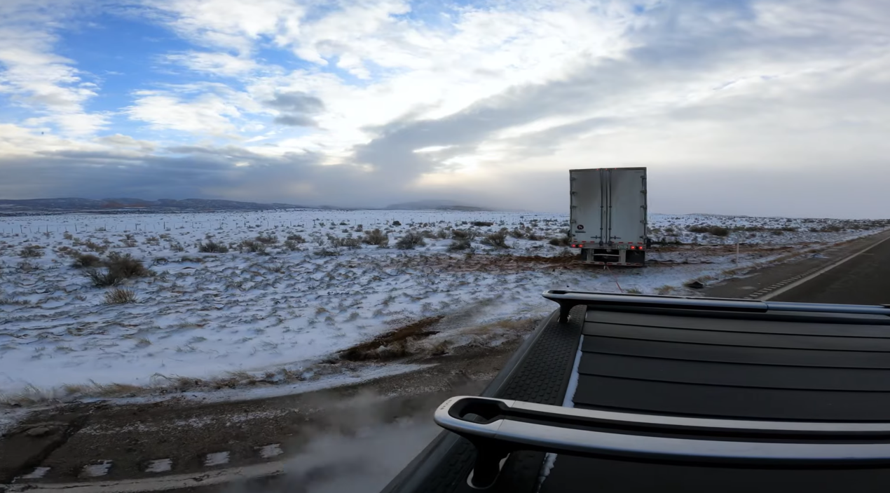 Rivian R1T rescues 38,000-pound Semi that slid off the road - Drive Tesla